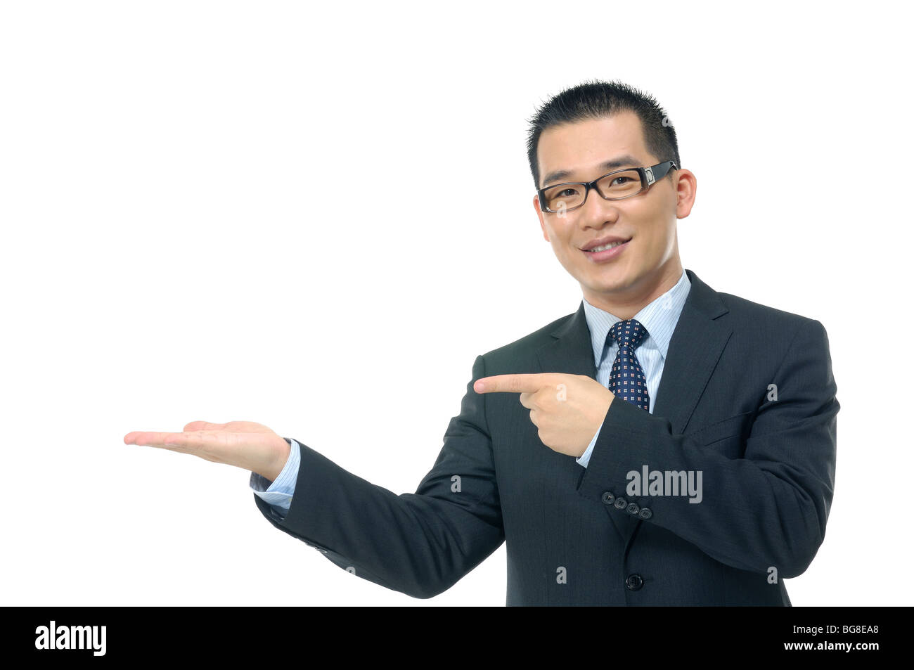 Portrait of a businessman pointing towards his palm Stock Photo - Alamy