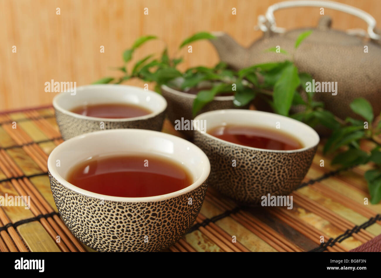 green leaves and tea in traditional Japanese set Stock Photo - Alamy