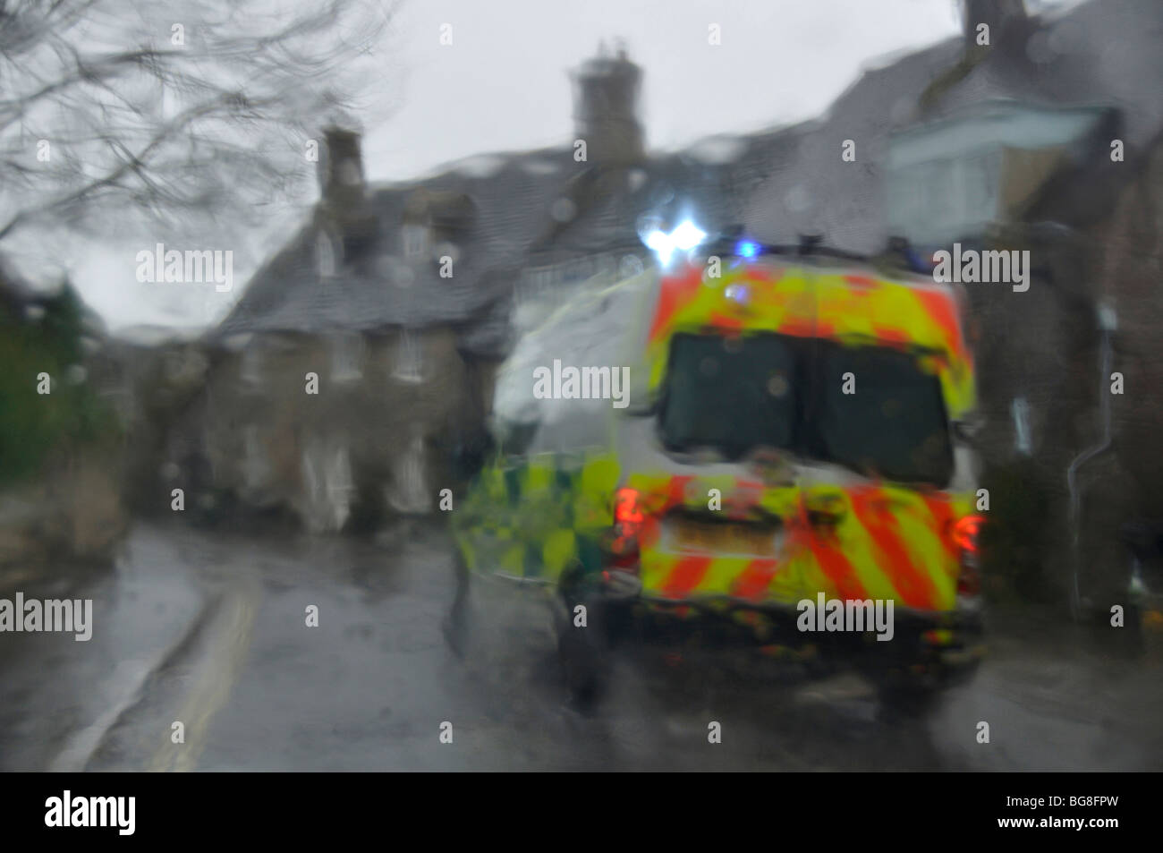 Ambulance through windscreen during heavy rain, Corfe castle Stock ...