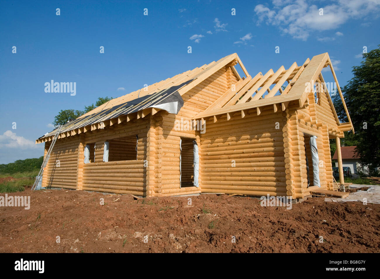 Construction of a wooden house Stock Photo - Alamy