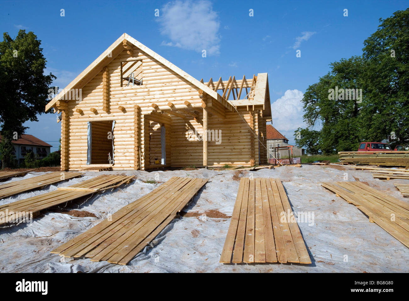 Construction of a wooden house Stock Photo - Alamy