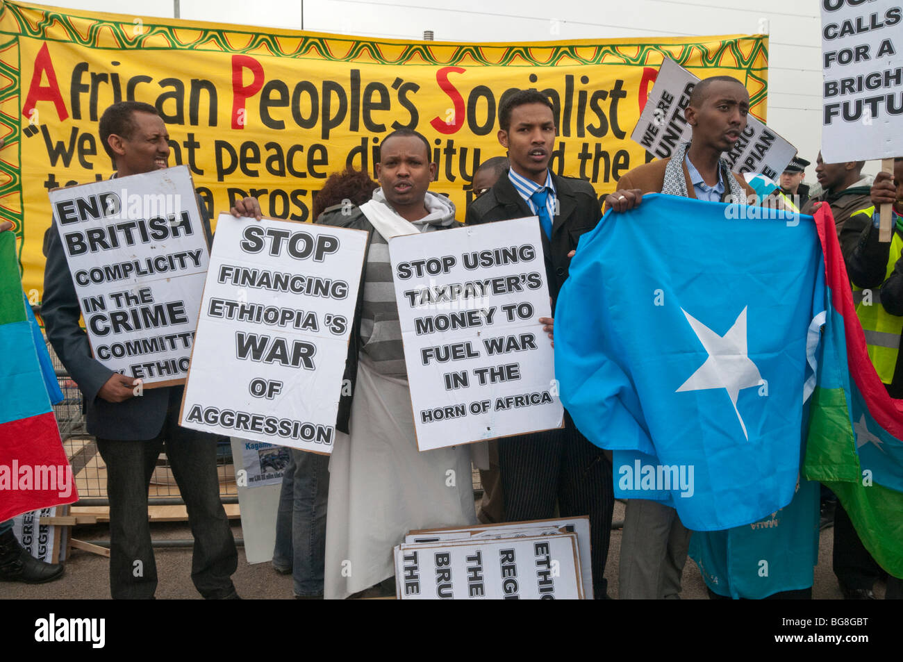 African People's Socialist Party banner and men with placards and ...