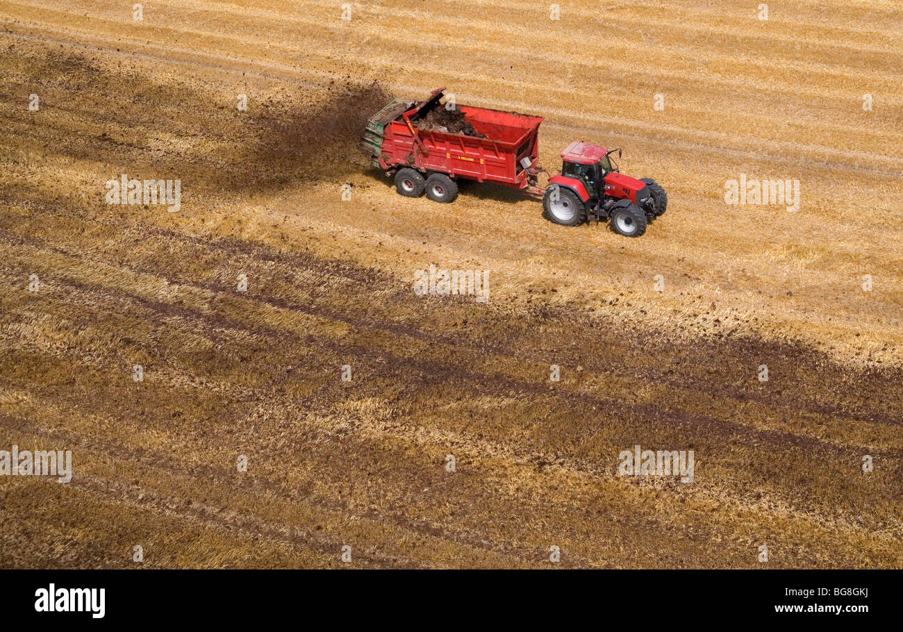 Aerial view, manure spreading Stock Photo - Alamy