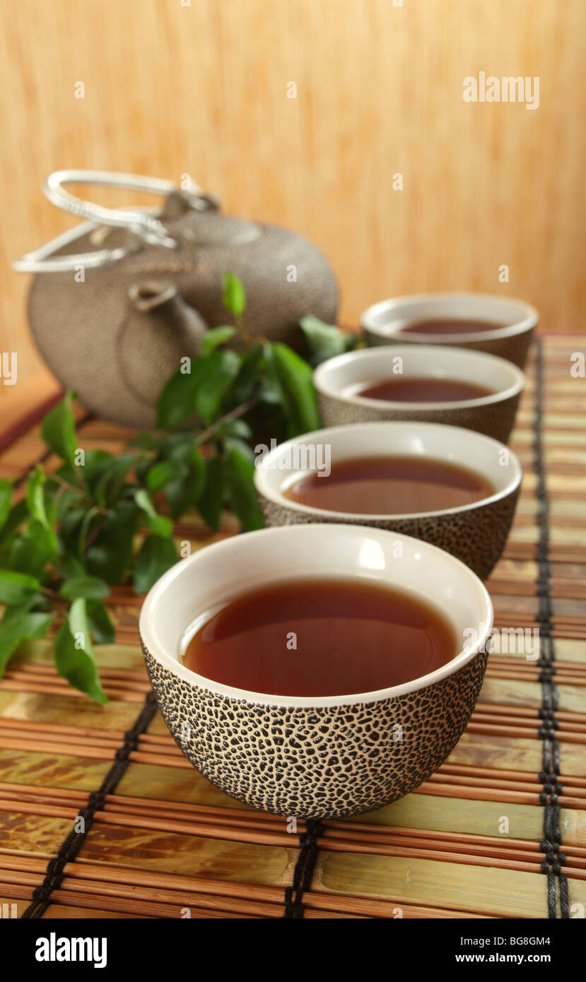 green leaves and tea in traditional Japanese set Stock Photo - Alamy