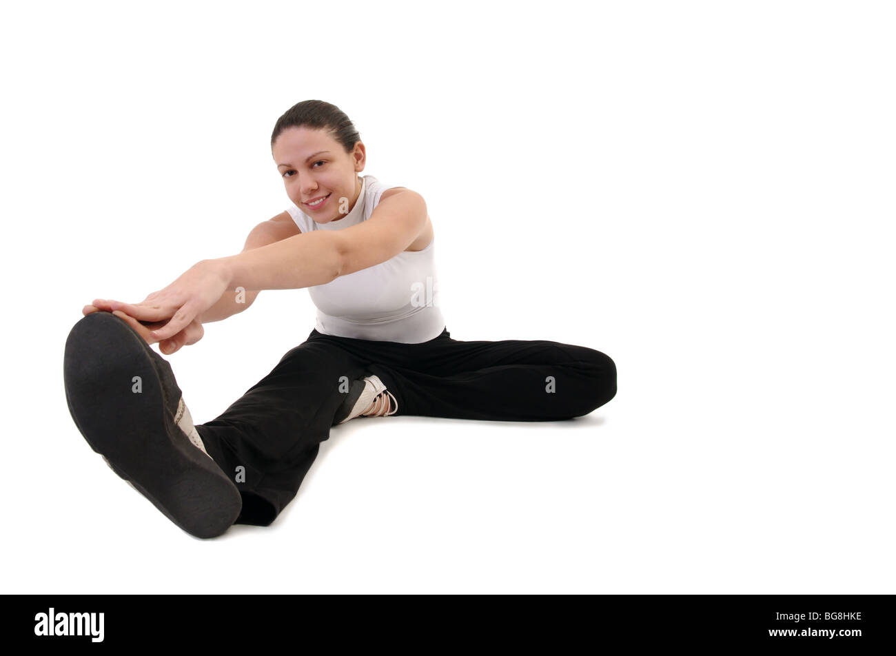 Runner Woman Stretching Over White background Stock Photo - Alamy