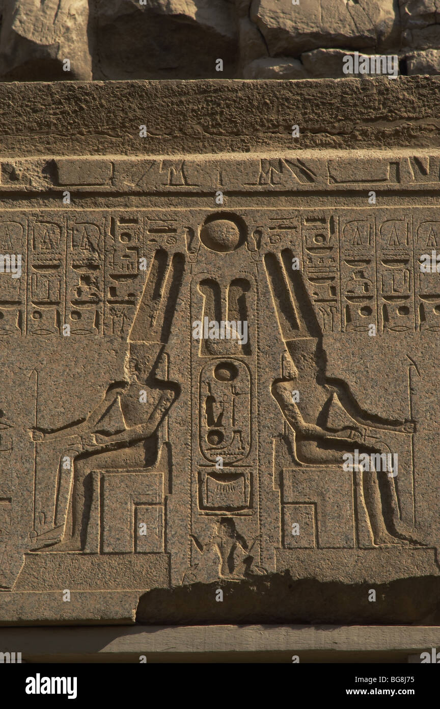Relief depicting god Amun with great helmet covered with two large ...