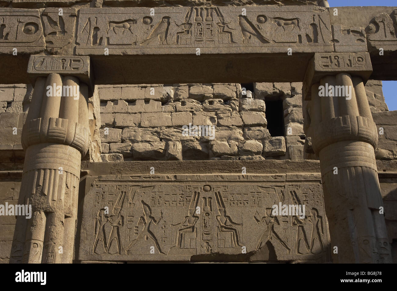 Relief depicting god Amun with great helmet covered with two large ...