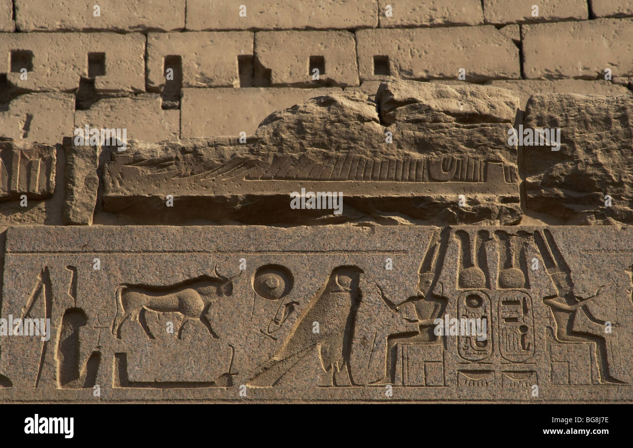 Relief depicting god Amun with great helmet covered with two large ...