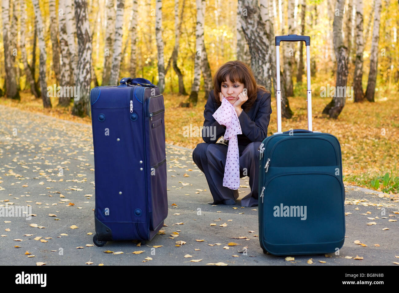 Sad Girl With Suitcase
