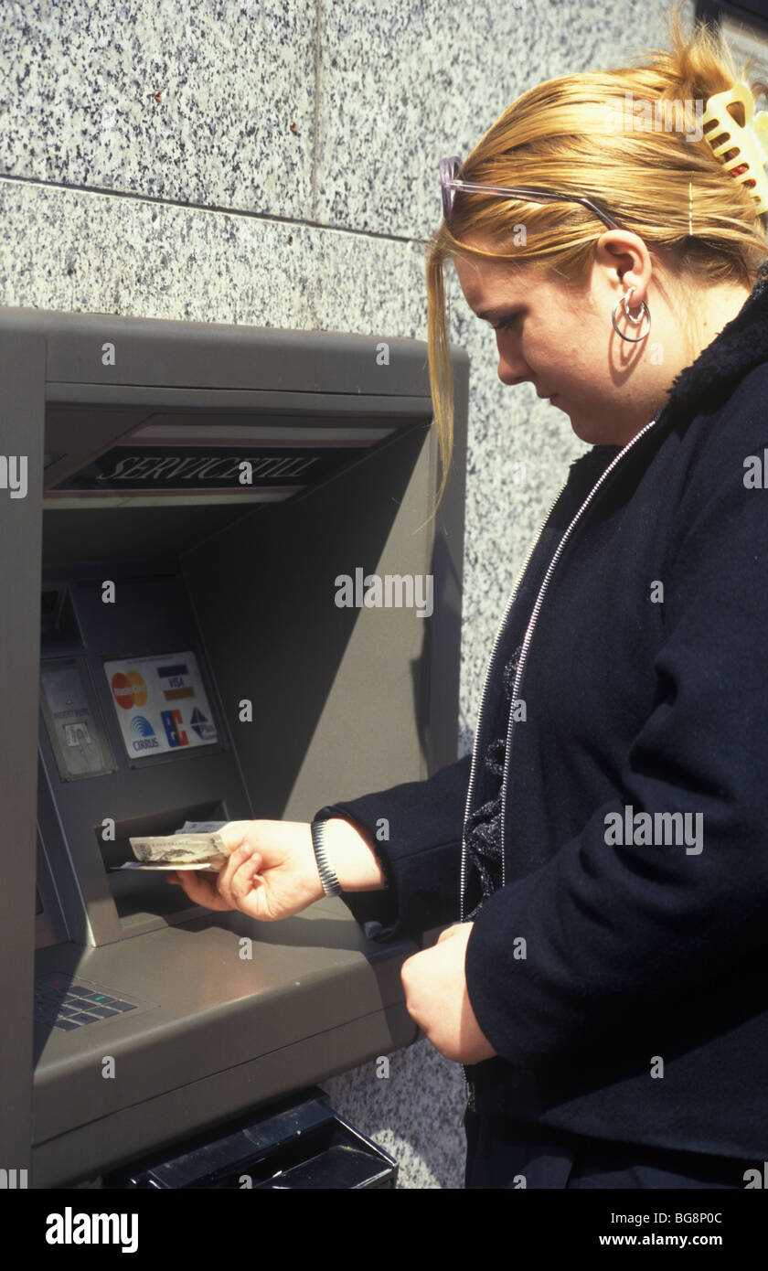 Teenager money hole in the wall hi-res stock photography and images - Alamy