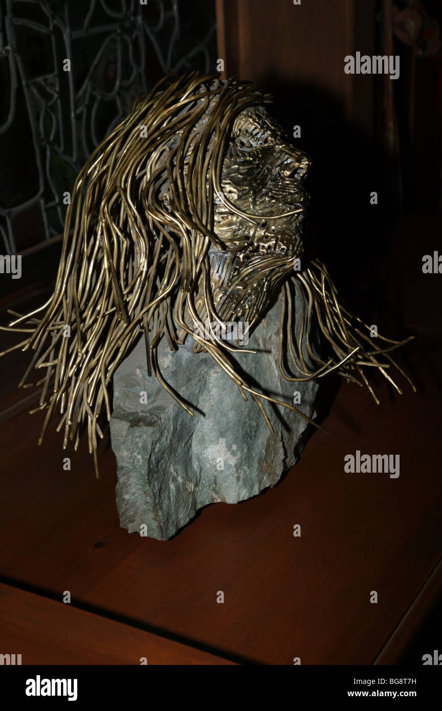 Stone and Copper tubing statue of Jesus Christ, in the living room of ...