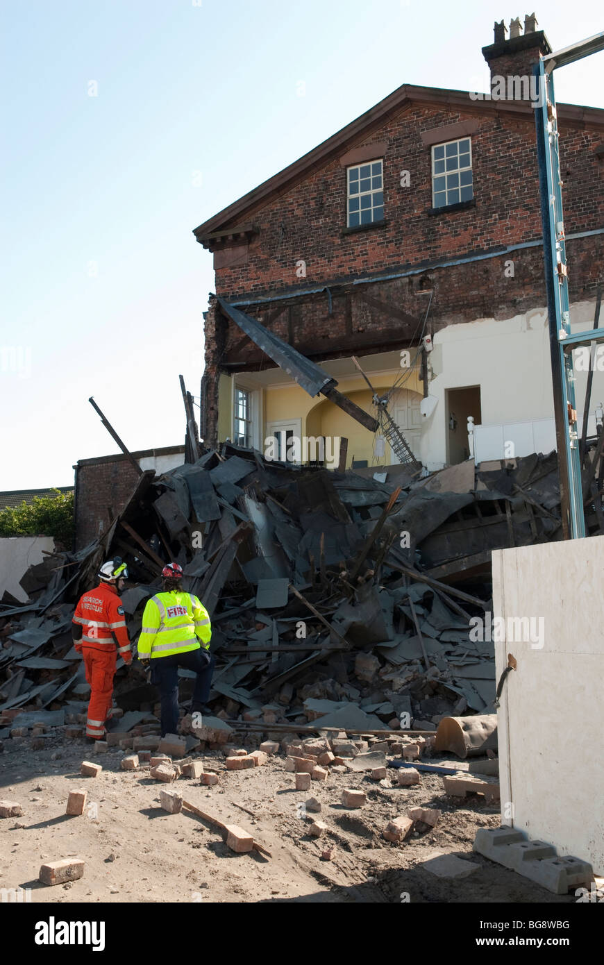 Fire Service USAR Urban Search And Rescue look for trapped people under ...
