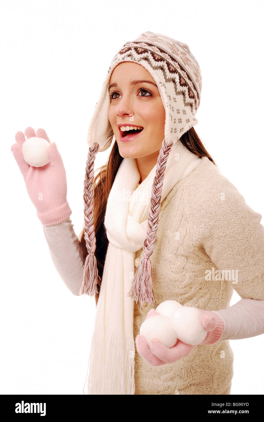 Young girl throwing snow ball Stock Photo - Alamy