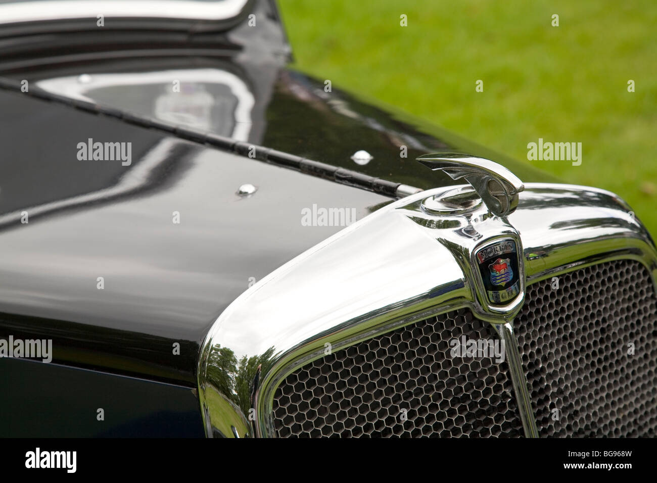 Hood bonnet ornament on vintage Morris Eight 8 Stock Photo - Alamy