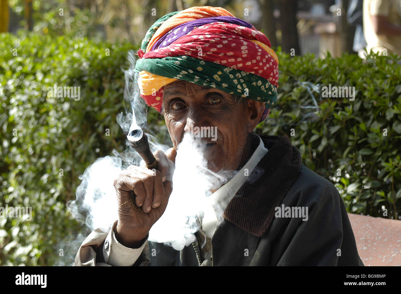 Chillum(Pipe) smoking tribal man Stock Photo - Alamy