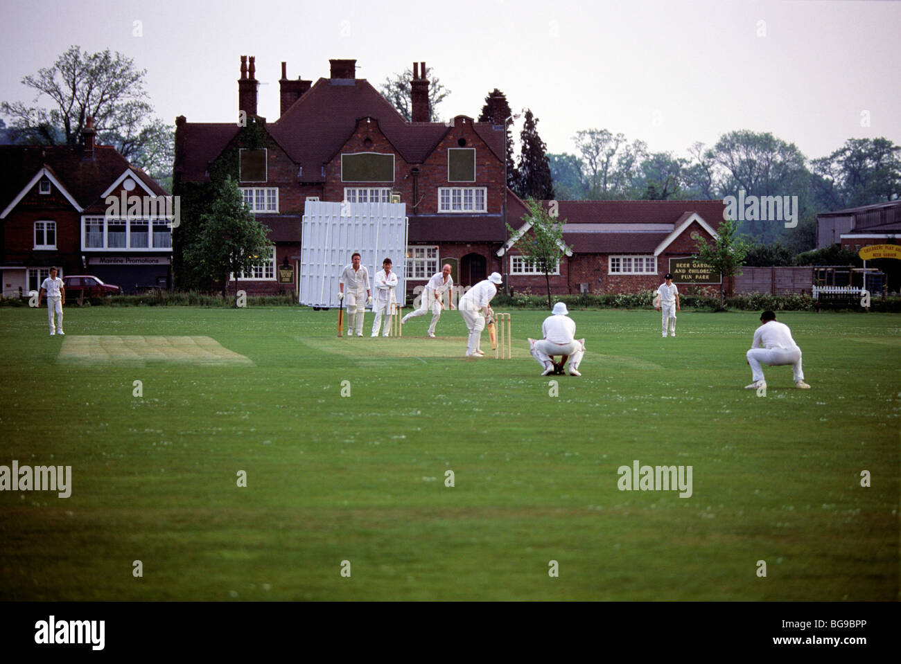Cricket match by club house Stock Photo - Alamy