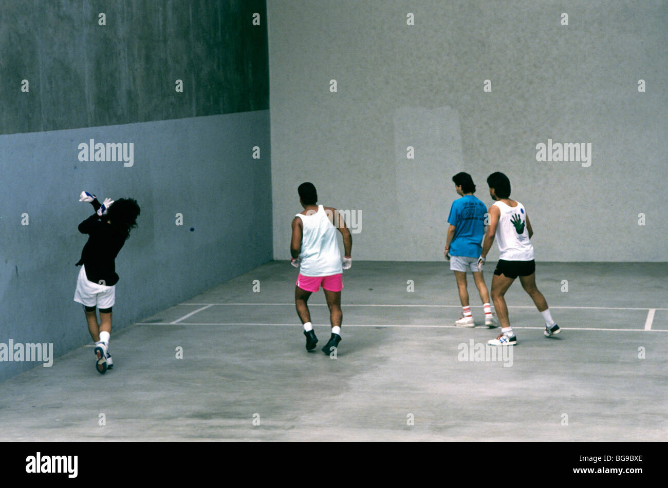 Four men playing handball Stock Photo - Alamy