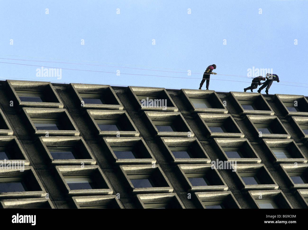 Three people abseiling hi-res stock photography and images - Alamy