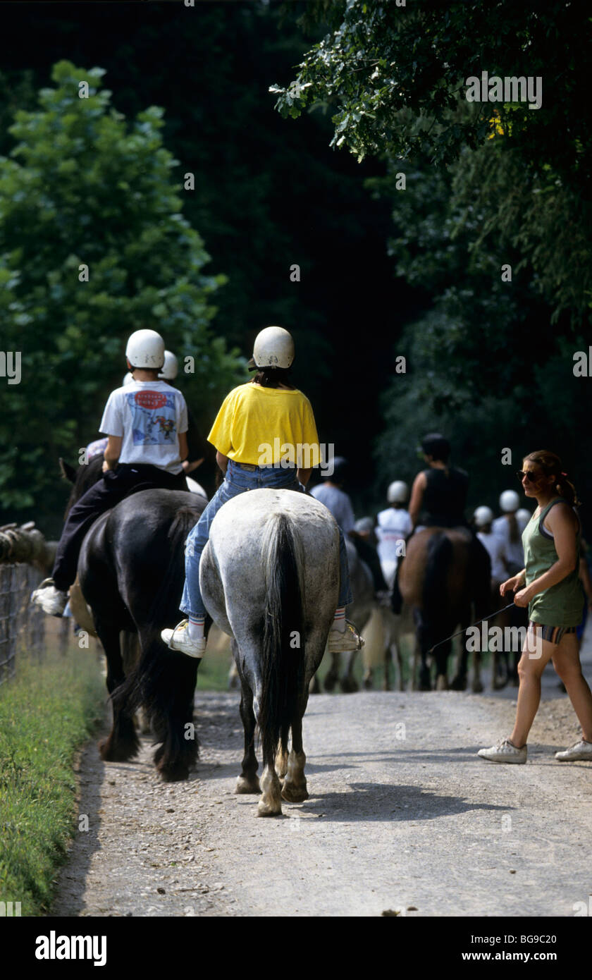 Group of horse riders on a trail Stock Photo - Alamy