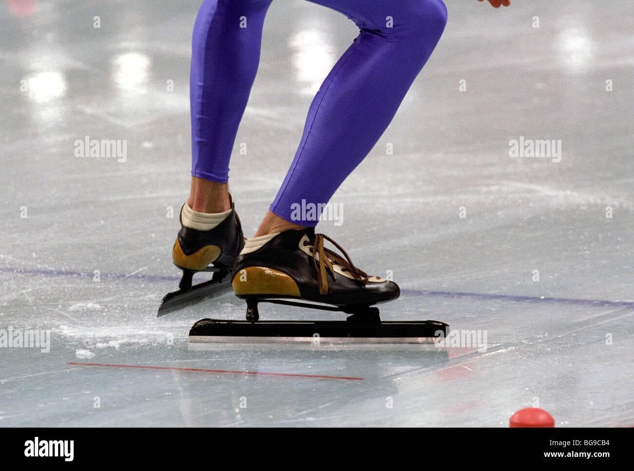 Speed skater at start of a race Stock Photo - Alamy