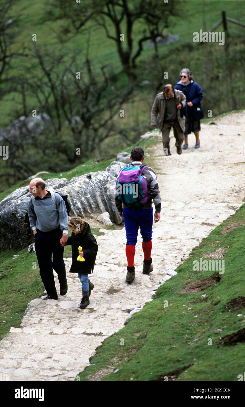 People walking along a hillside step path Stock Photo - Alamy