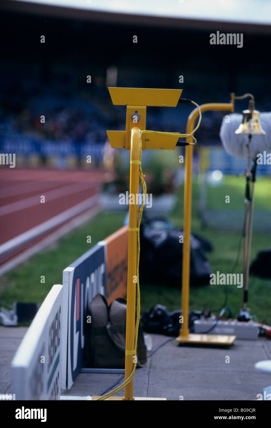 Electronic lap marker with bell by running track Stock Photo - Alamy