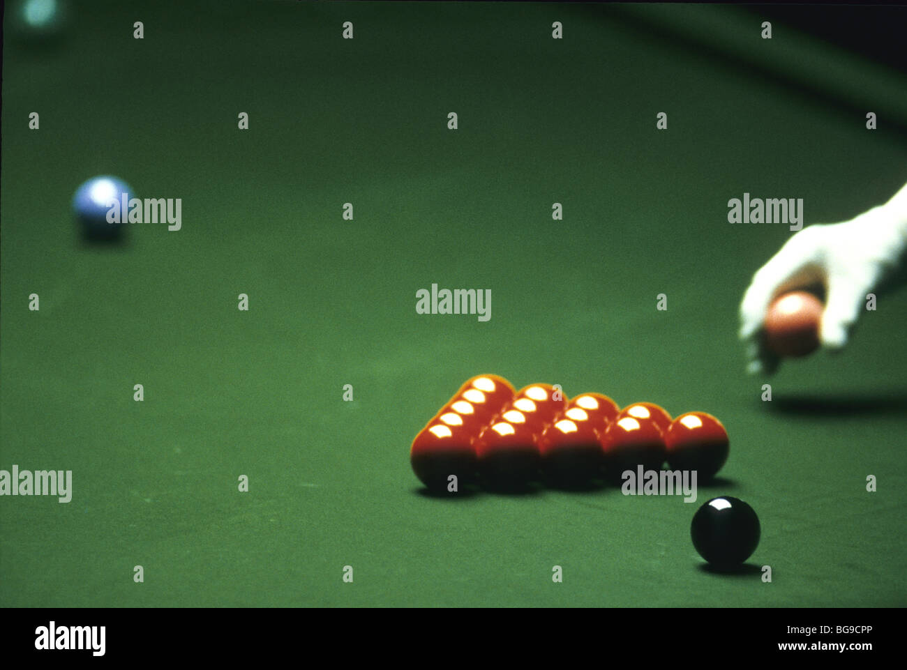 Snooker balls being placed in formation Stock Photo - Alamy