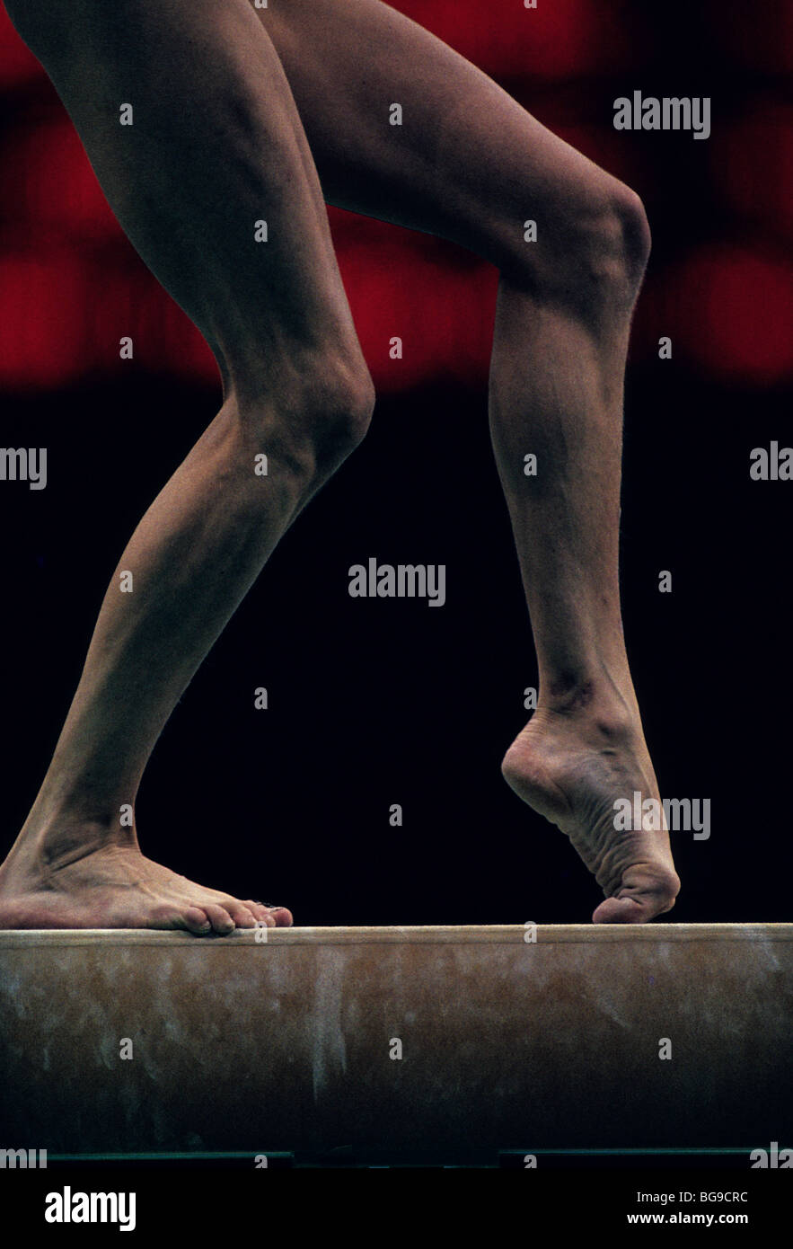 gymnast performing on beam Stock Photo - Alamy