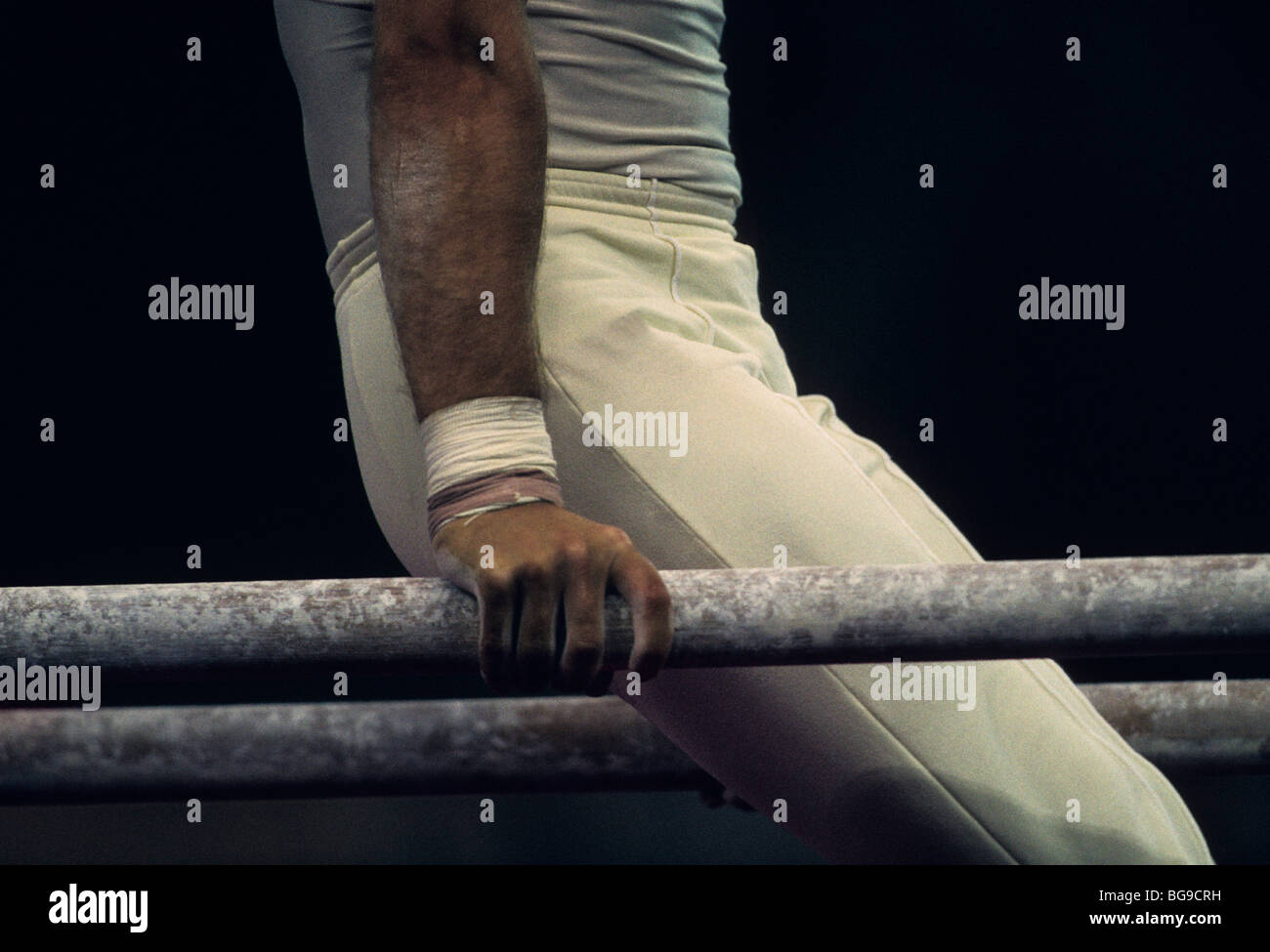 gymnast performing on parallel bars Stock Photo - Alamy