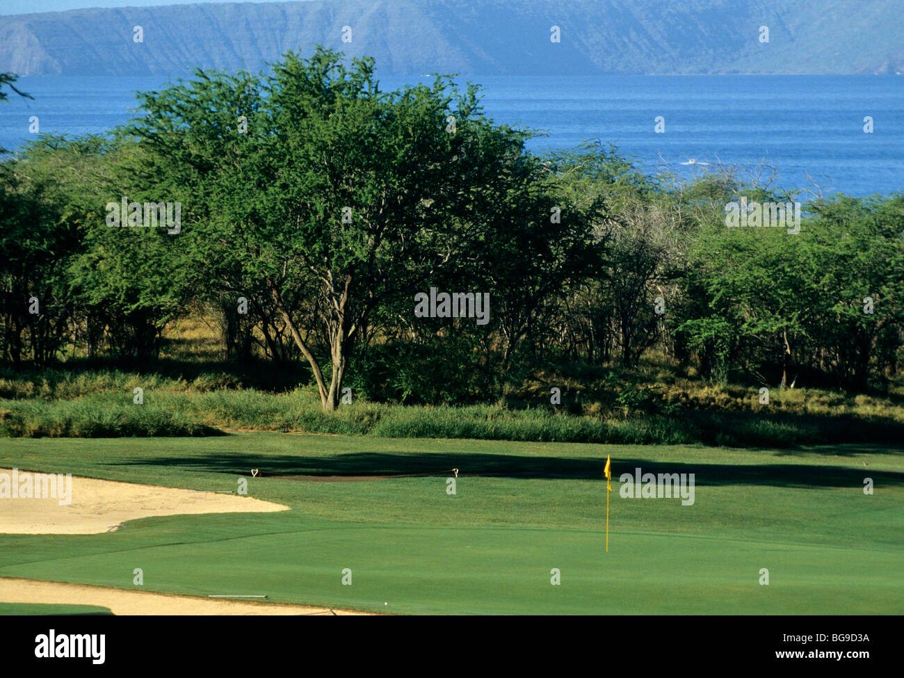 Golf course fairway by a lake Stock Photo - Alamy