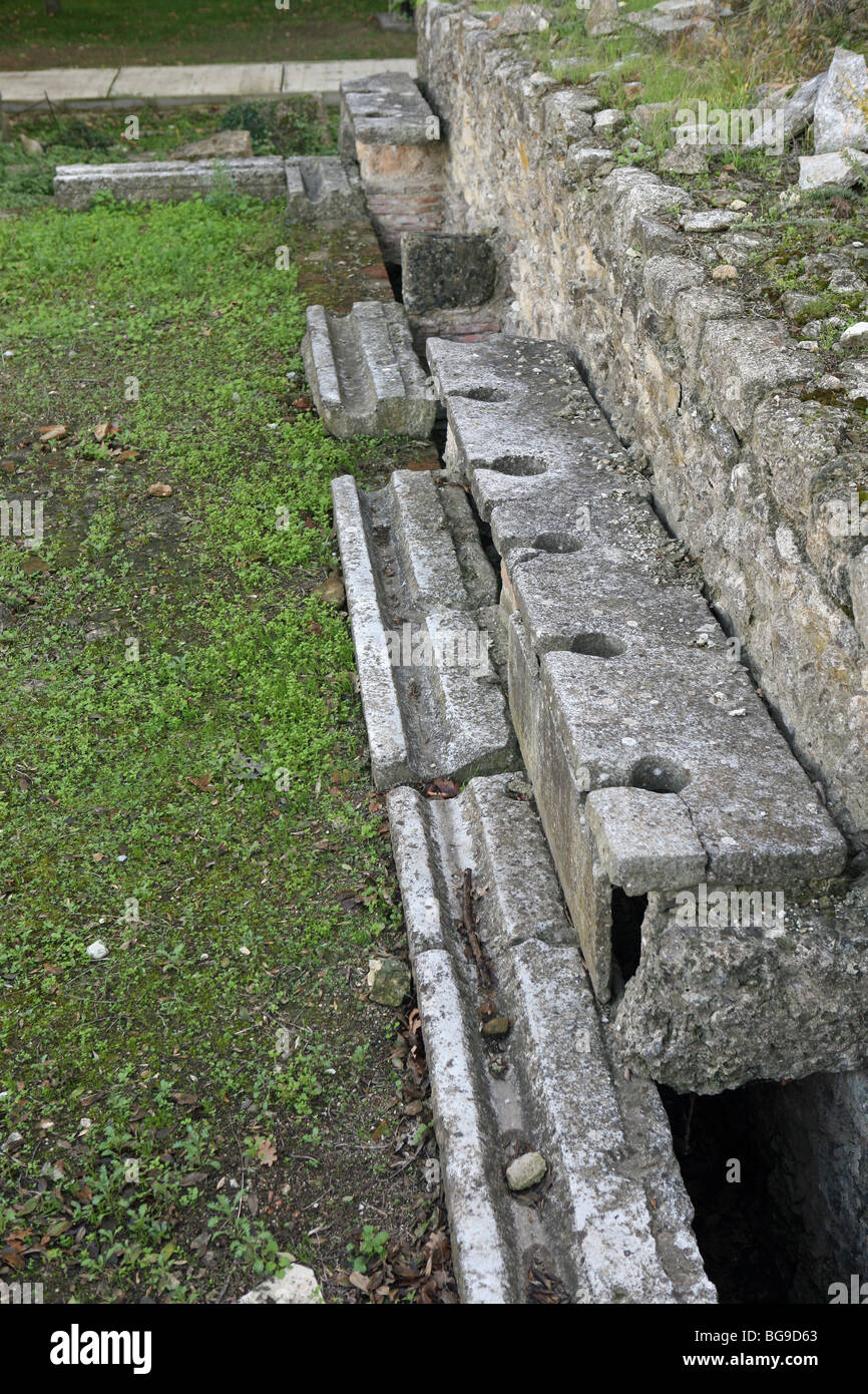 Ancient toilet or ablutions block in Ancient Dion Greece Stock Photo ...