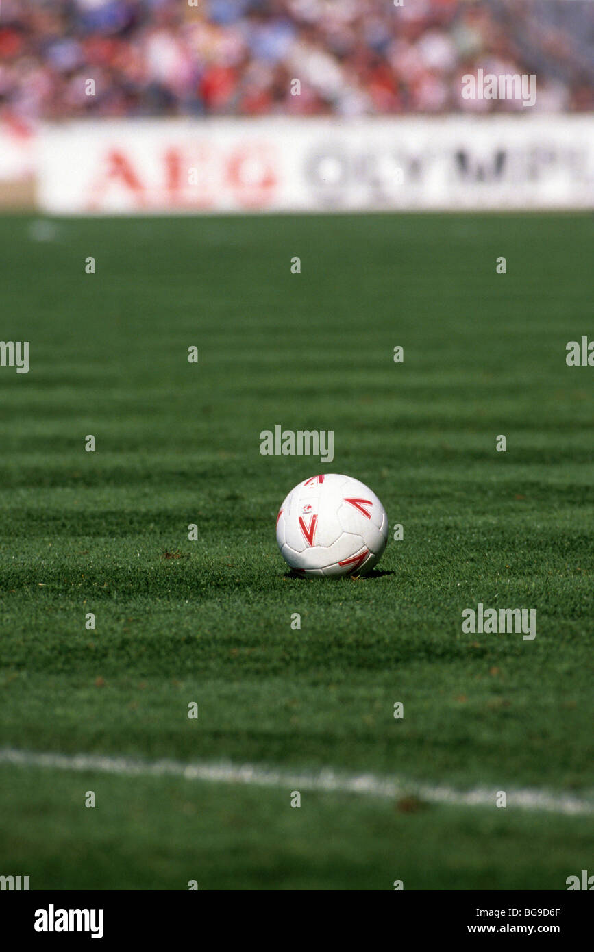 Football on a pitch Stock Photo - Alamy