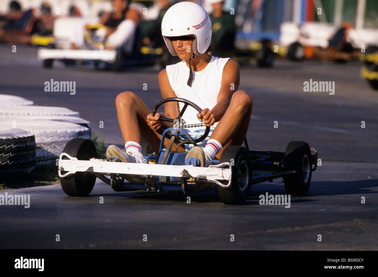 Young man driving a go kart Stock Photo - Alamy