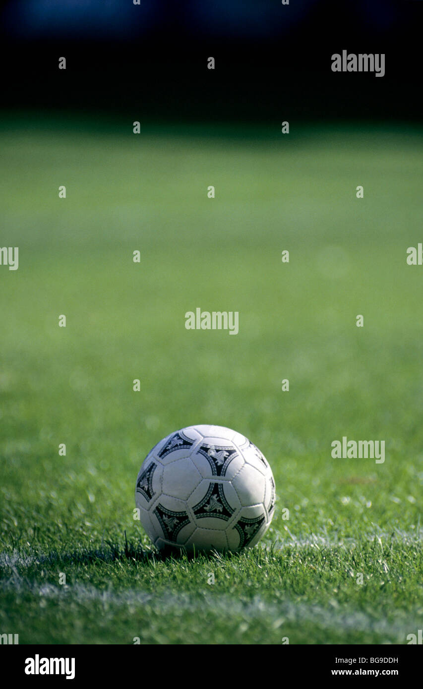 Football on a pitch Stock Photo - Alamy