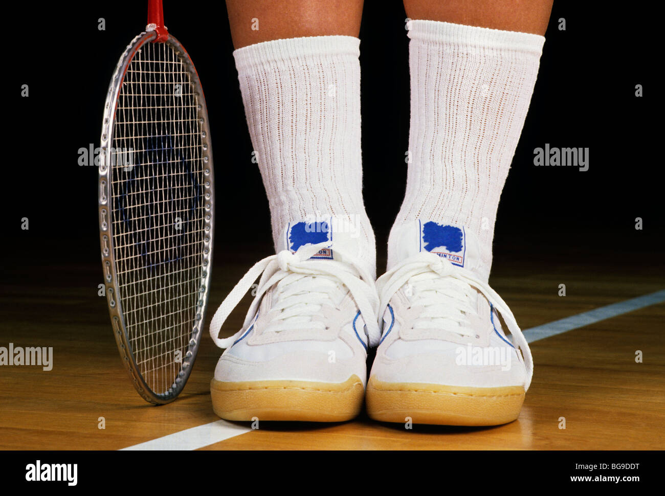 Close up of a badminton players feet and racquet Stock Photo - Alamy