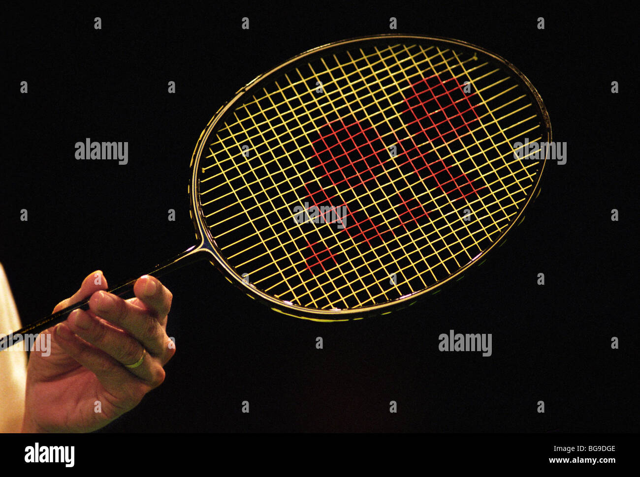 Close up of a badminton player holding his racquet Stock Photo - Alamy