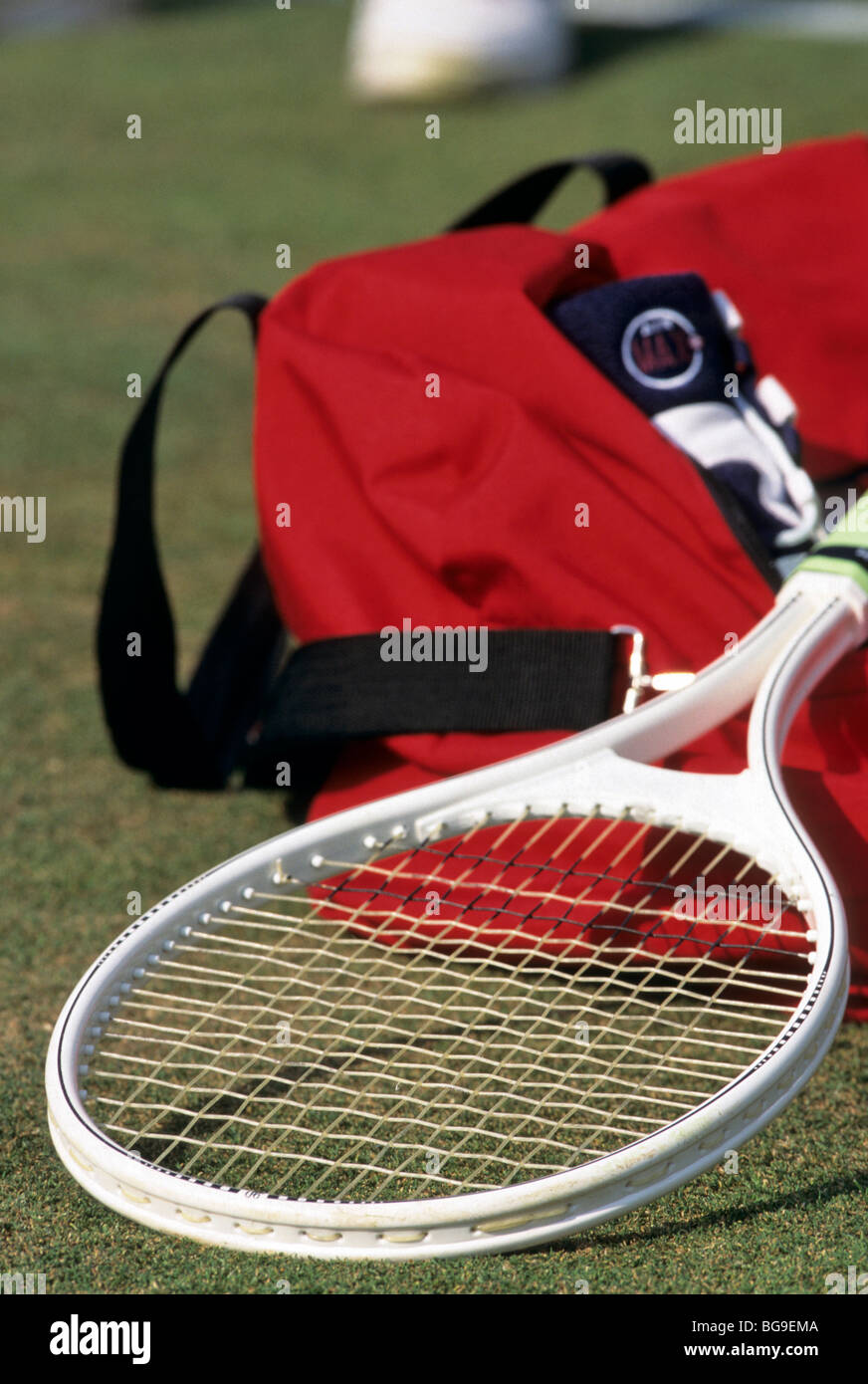 Tennis bag and racquet on a tennis court Stock Photo - Alamy
