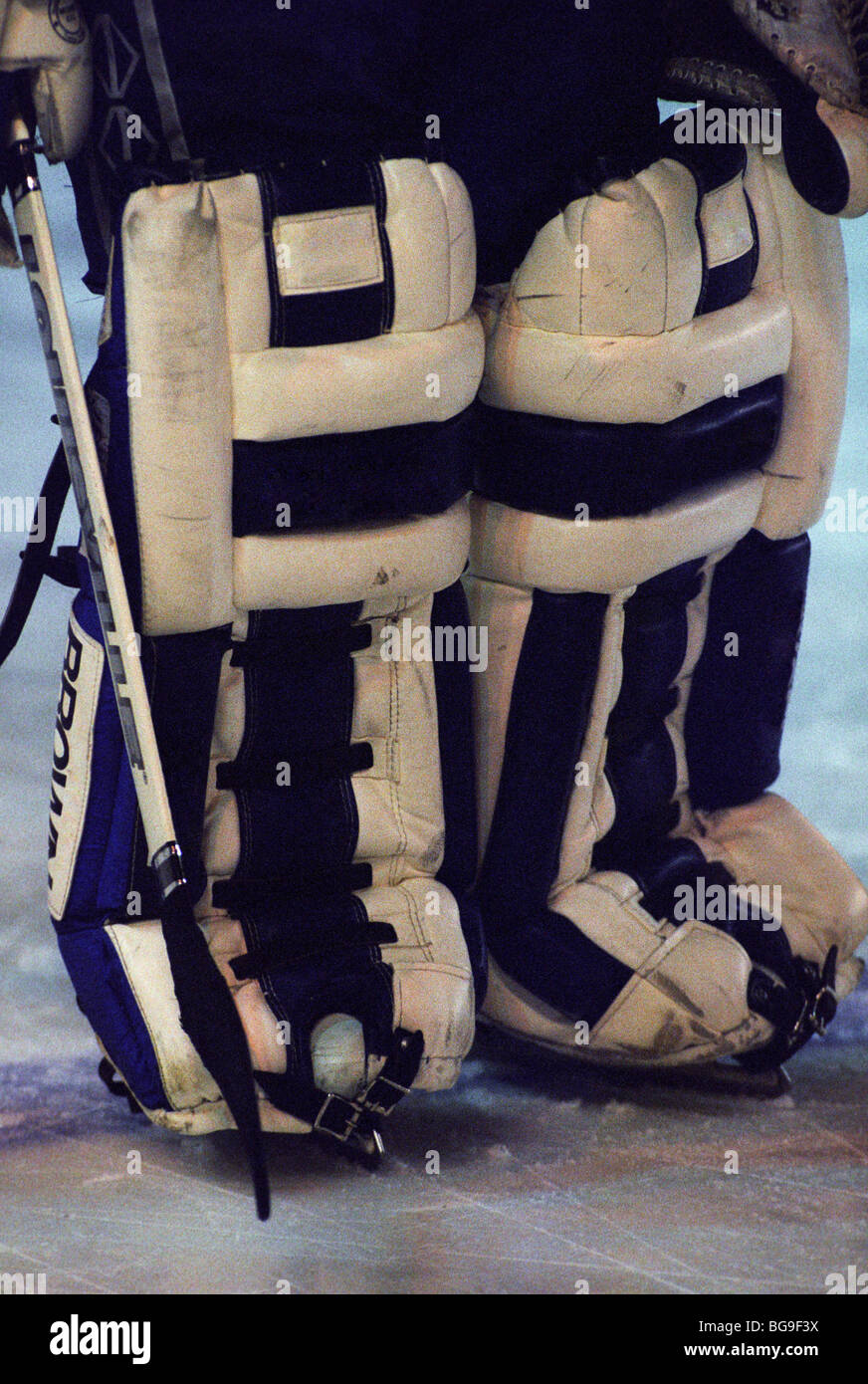 Ice hockey player in protective gear Stock Photo - Alamy