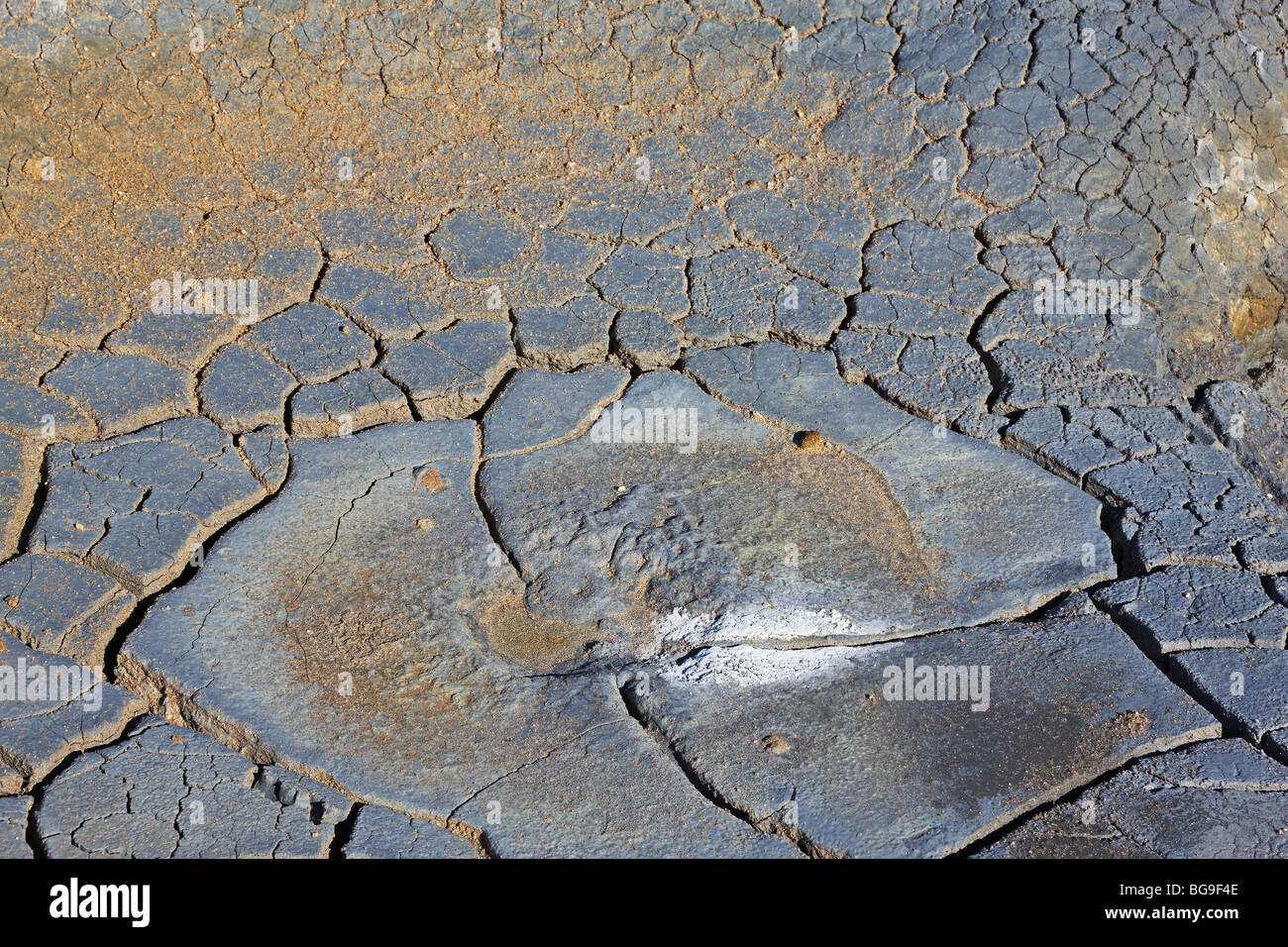Cracked mud in Hverir, geothermal fields around Namafjall mountain ...