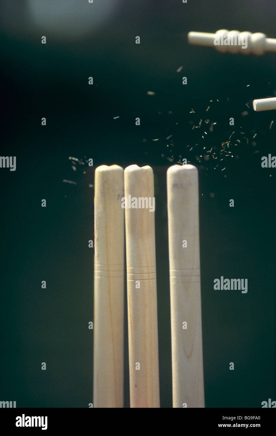 Close up of a wicket strike with bails flying Stock Photo - Alamy