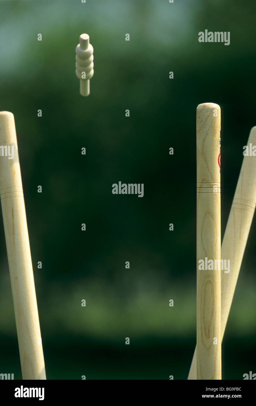Close up of a wicket strike with bails flying Stock Photo - Alamy