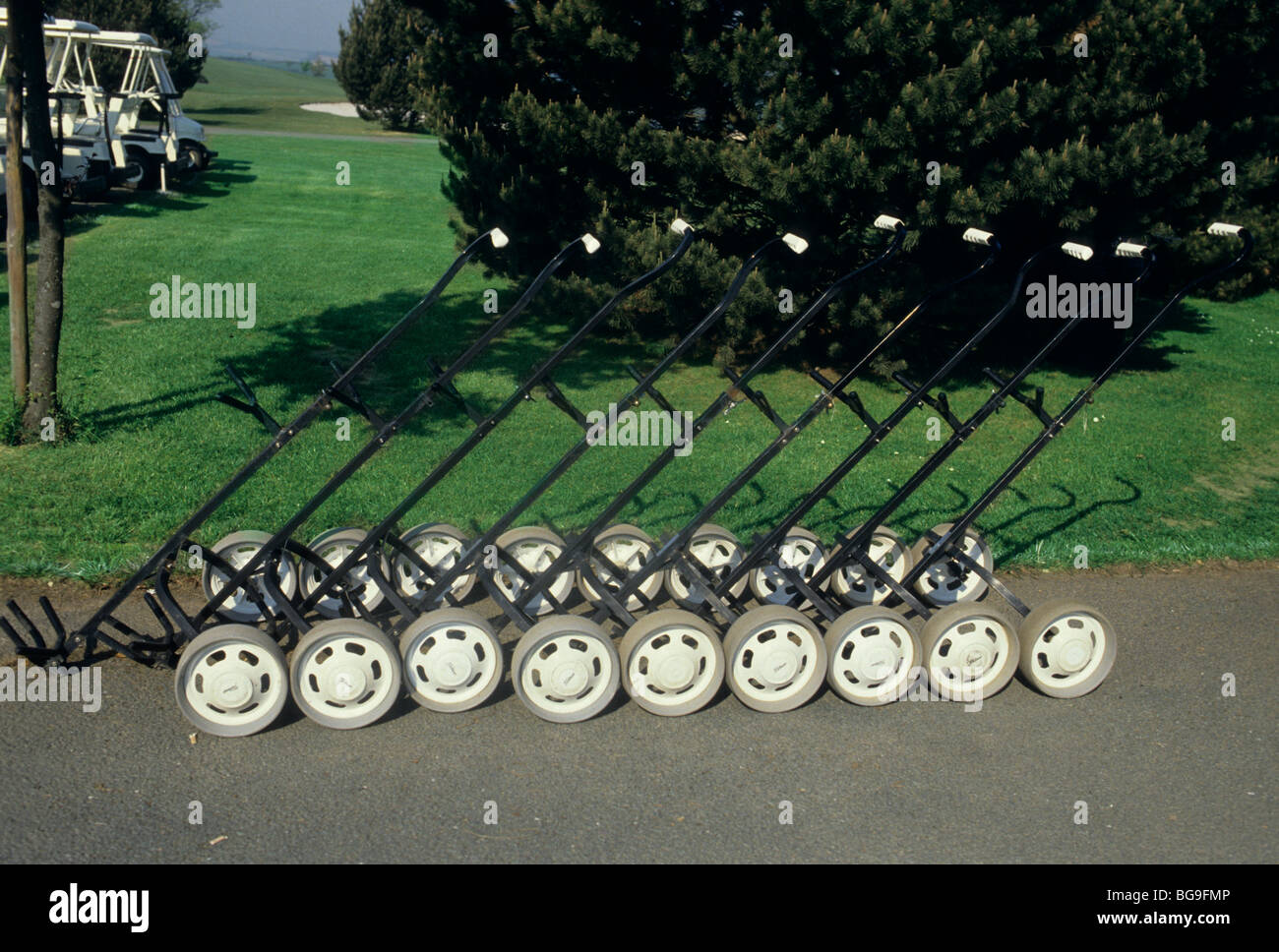 Group of pull carts by a golf course Stock Photo - Alamy
