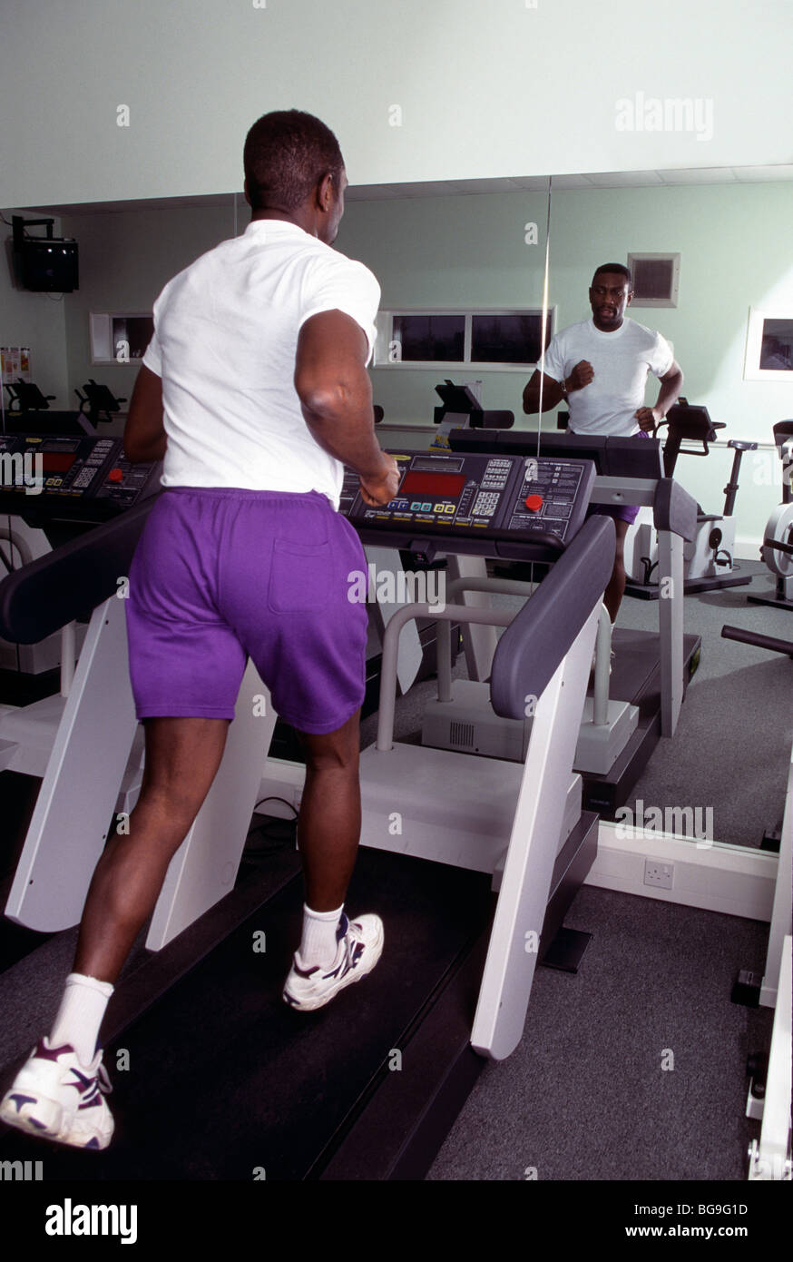 Man on a treadmill Stock Photo - Alamy