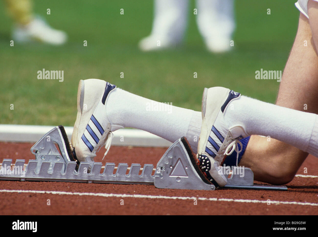Sprinter in the starting block Stock Photo - Alamy
