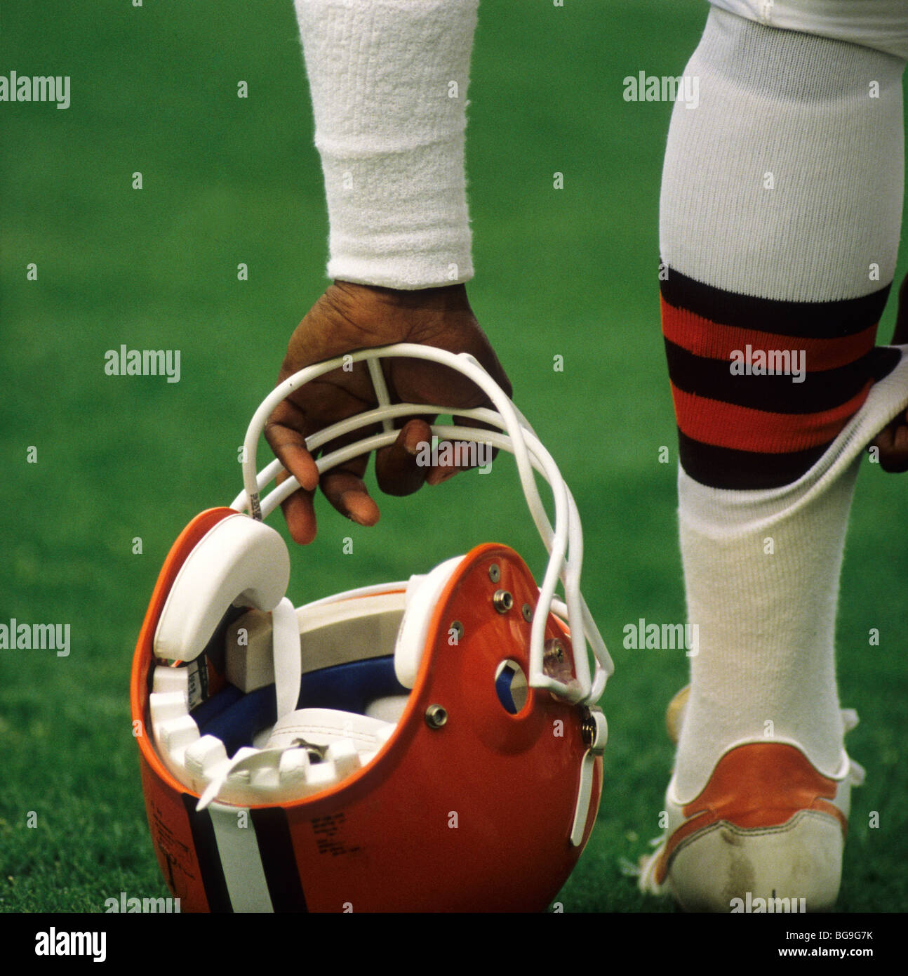 Close up of an American football player holding his helmet Stock Photo ...