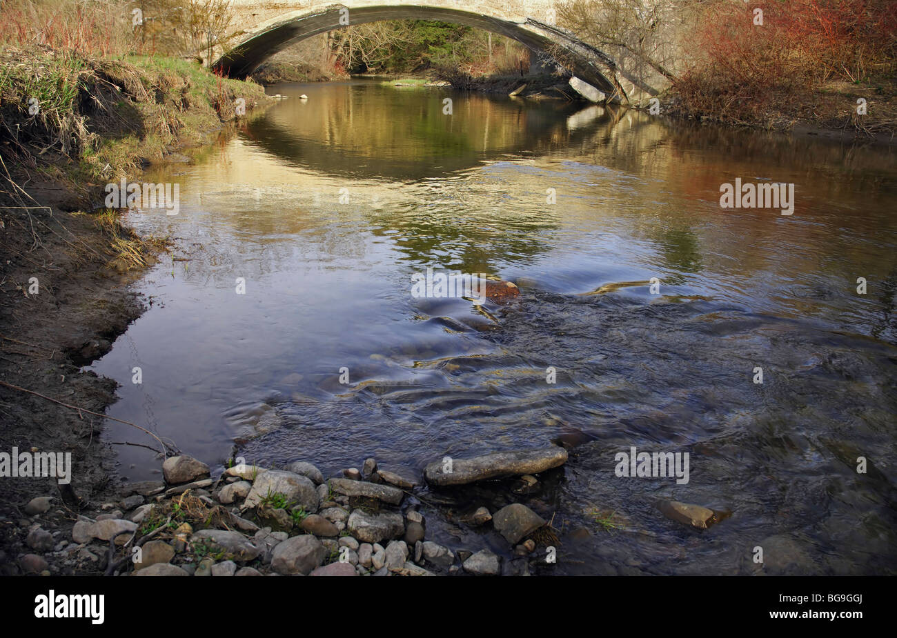river, rocks and bridge Stock Photo - Alamy