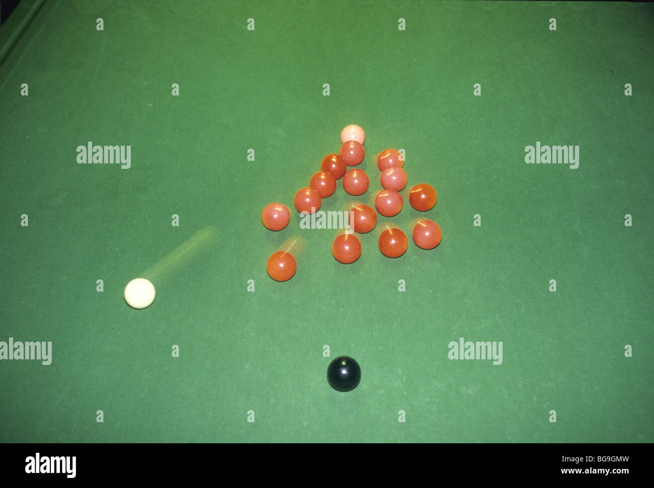 Action shot of white ball breaking a rack of snooker balls Stock Photo ...