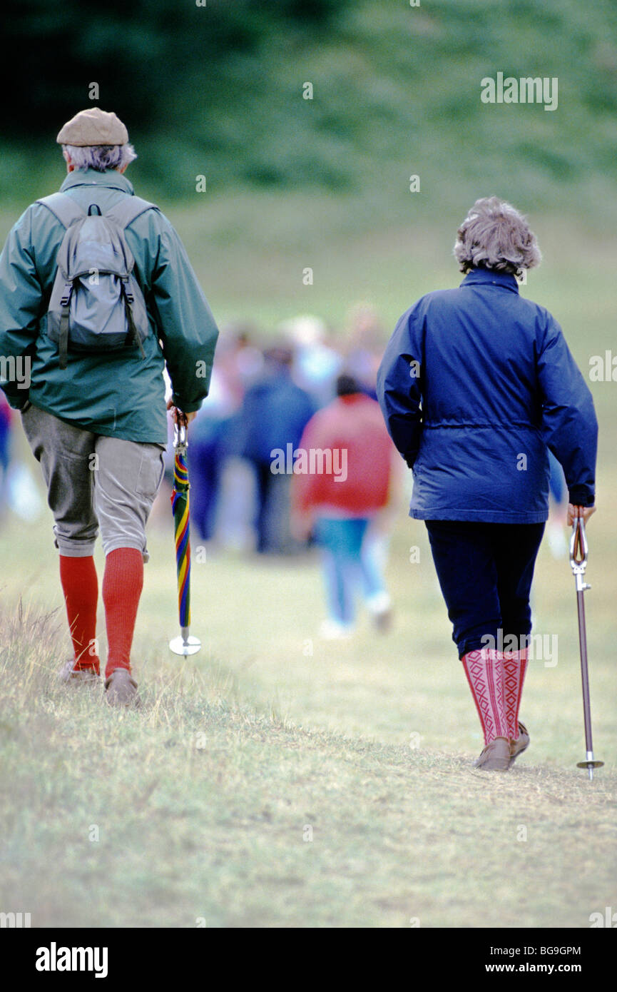 Hill walkers wearing traditional attire Stock Photo - Alamy