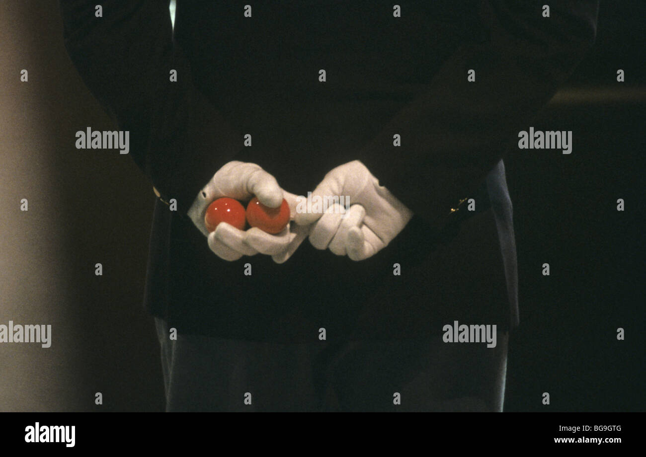 Rear view of referee with two red balls in his hand Stock Photo - Alamy