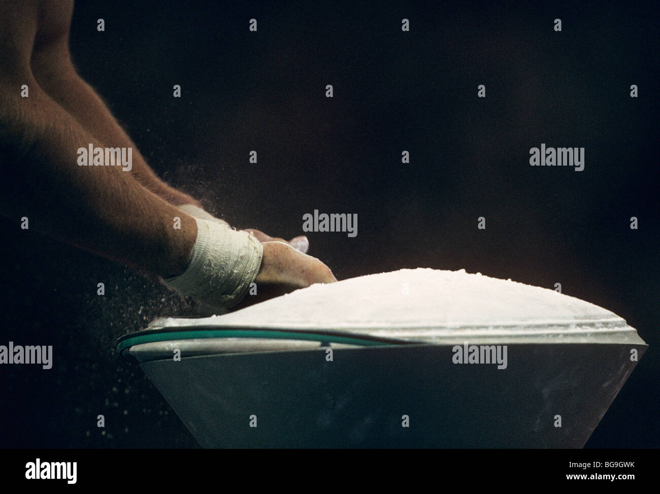 male gymnast chalking hands Stock Photo - Alamy